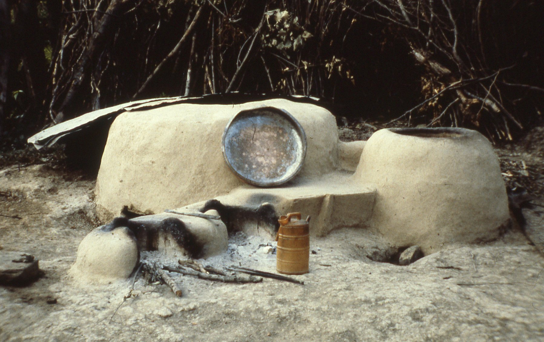 Outdoor earth cooking stoves | DW Digital Archive